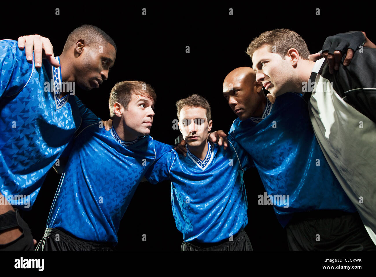 Soccer team planning game in huddle Stock Photo - Alamy