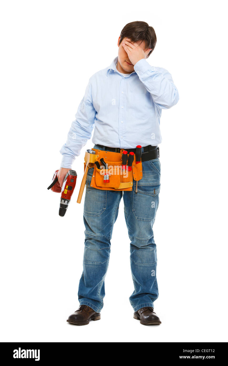 Full length portrait of concerned construction worker Stock Photo - Alamy