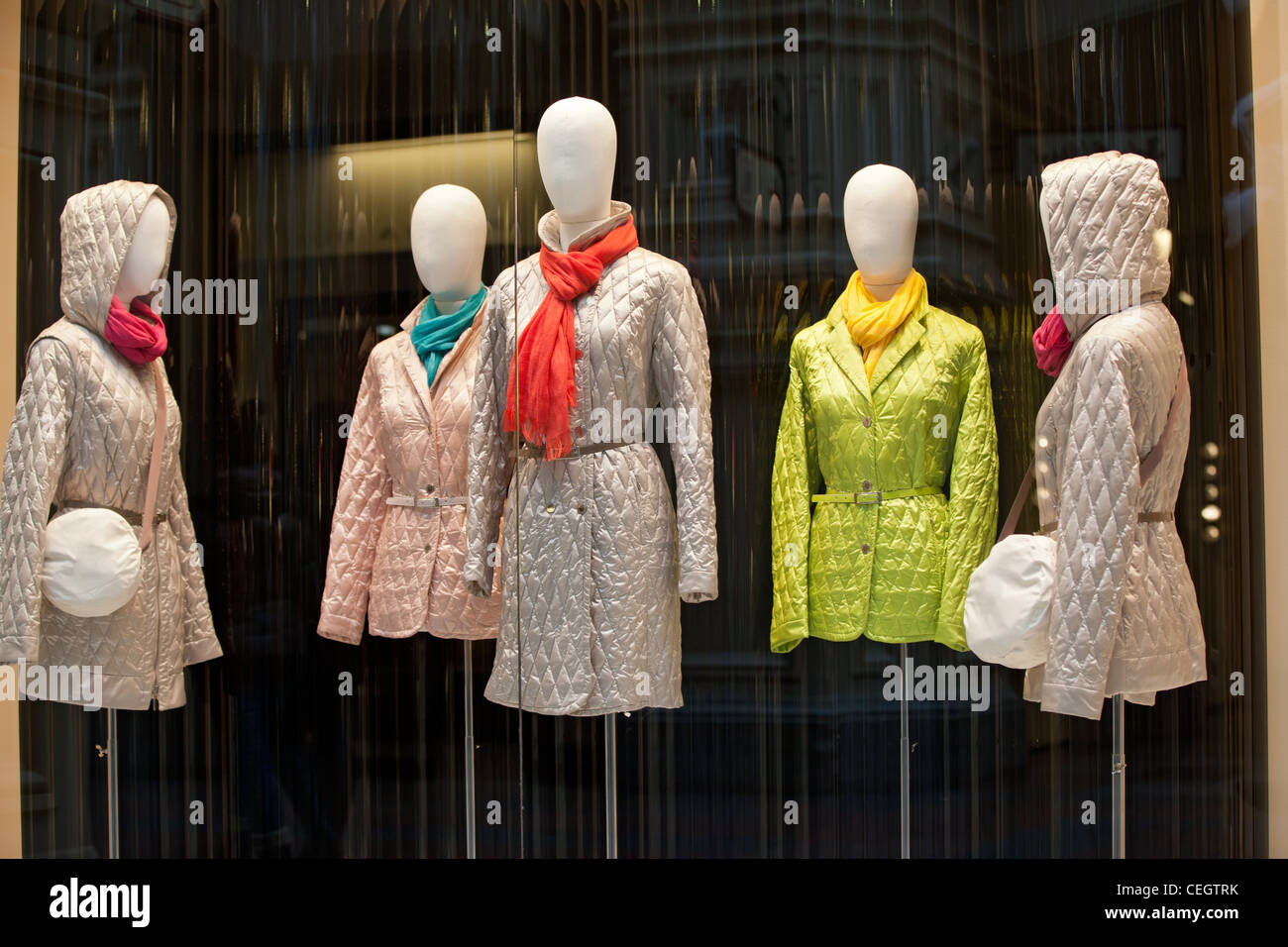 Female mannequins dressed in winter clothes are on display at the Stock ...