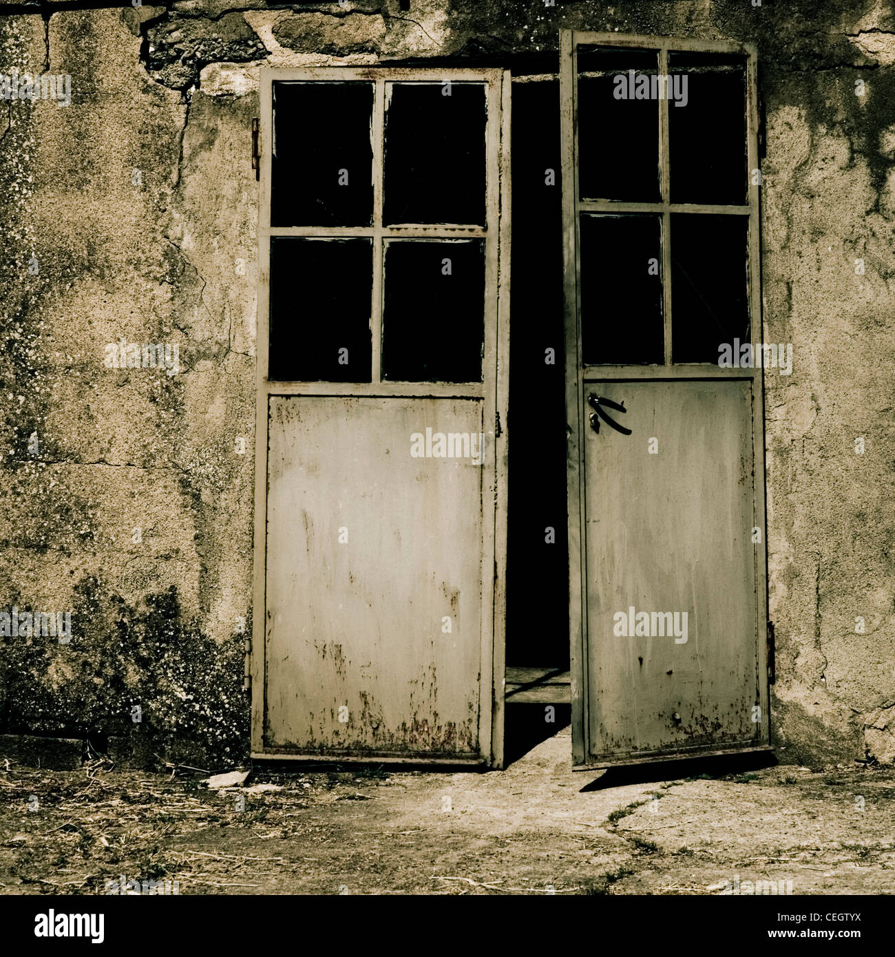 Old building with open door Stock Photo - Alamy