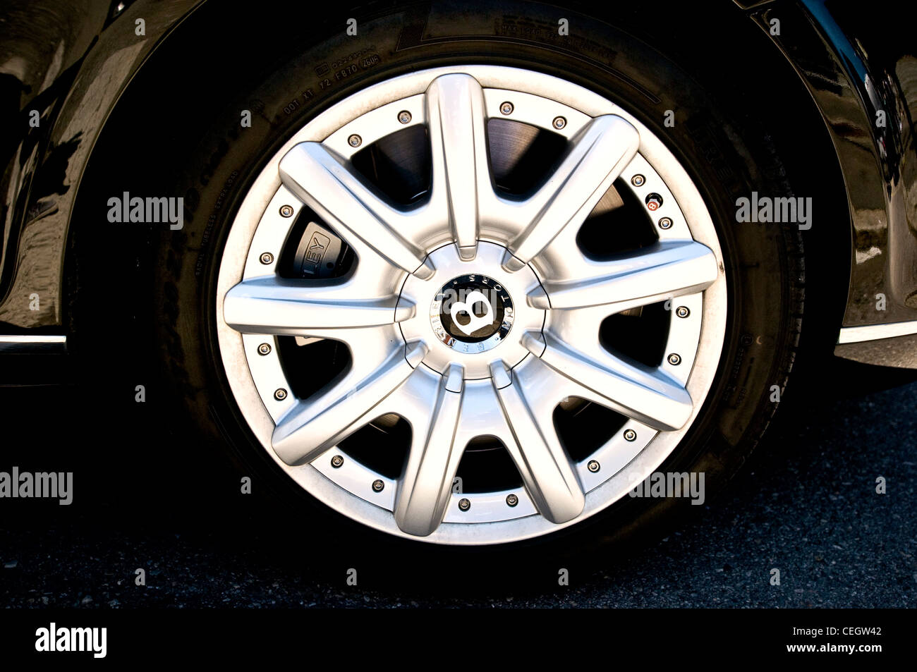 wheel of a newlyweds car at an italian wedding Stock Photo - Alamy