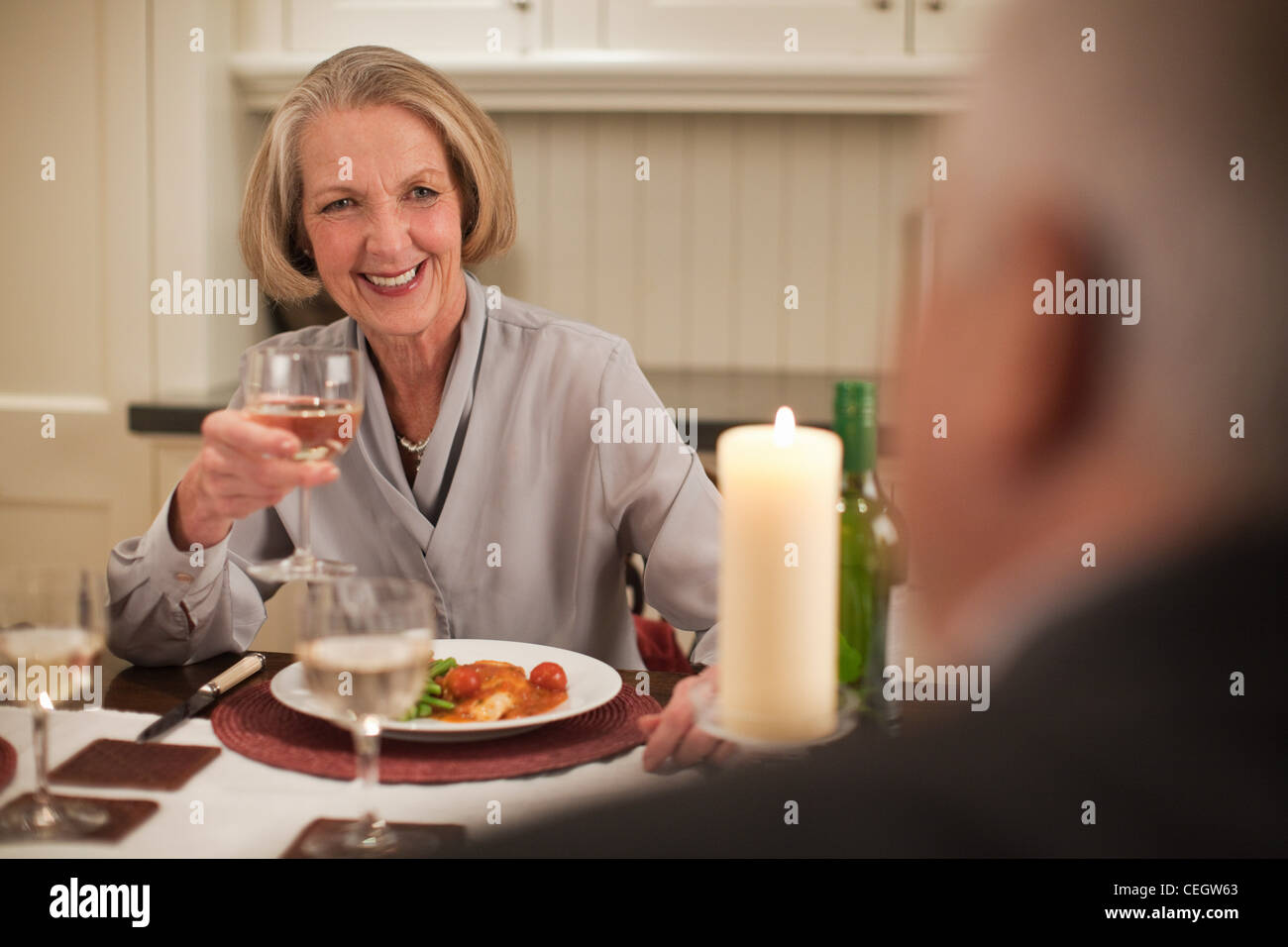 Older people gathering dinner party hi-res stock photography and images ...