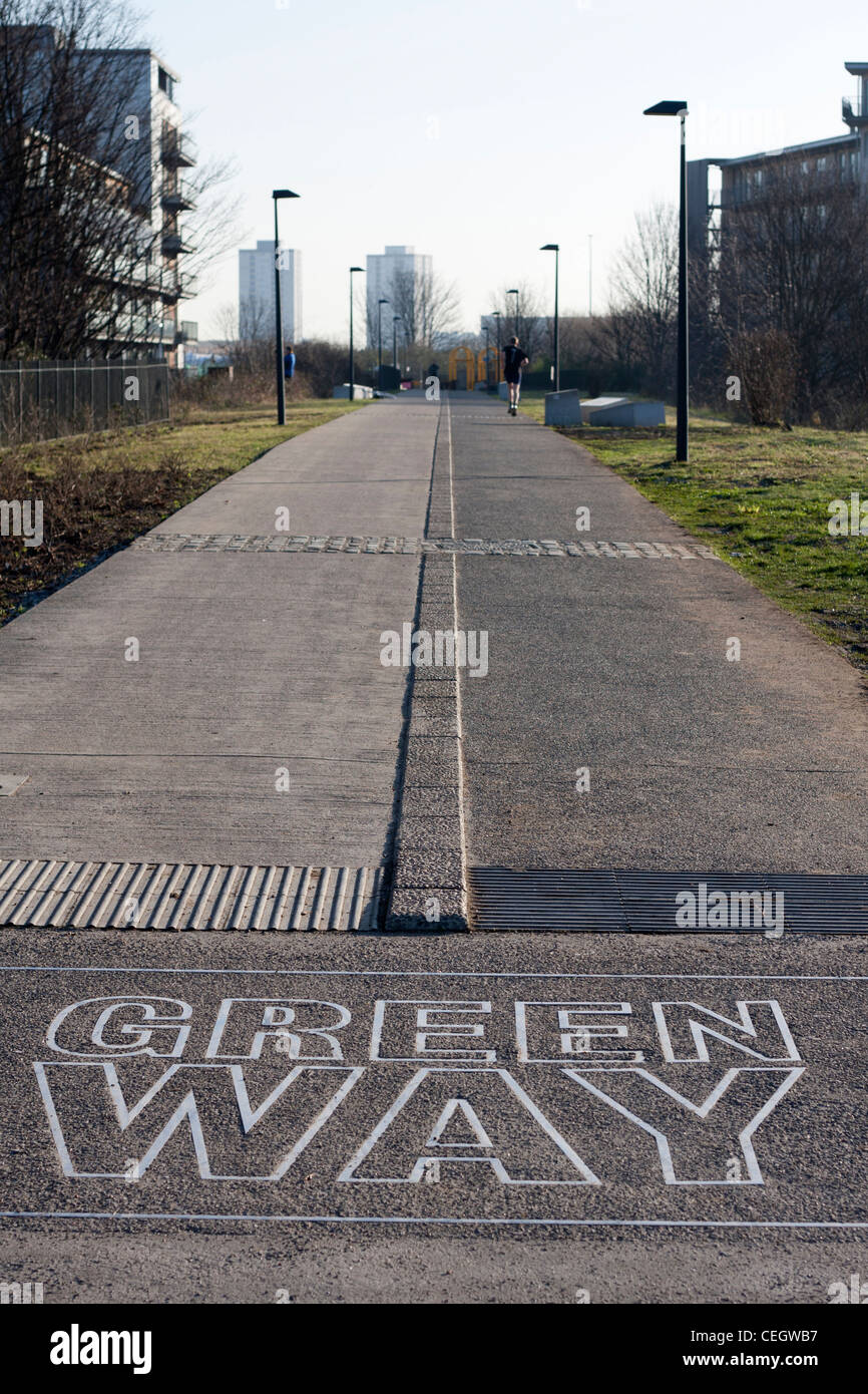 Greenway sign and path, for bikes, walking and jogging. View down path ...
