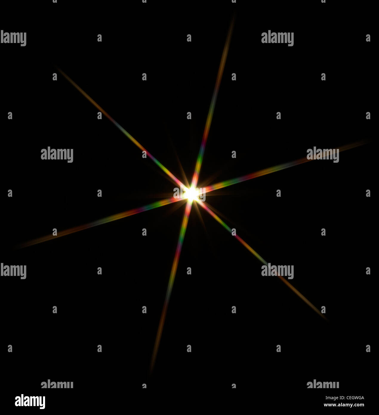 colorful flashy spotlight star made with optical star filter on camera ...