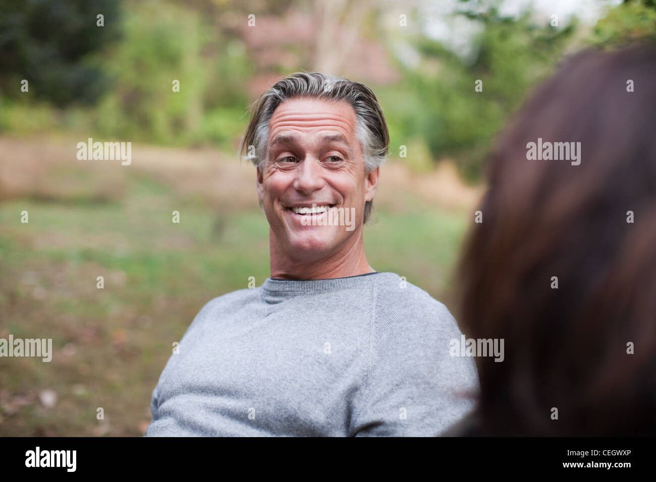 Mature man smiling Stock Photo - Alamy