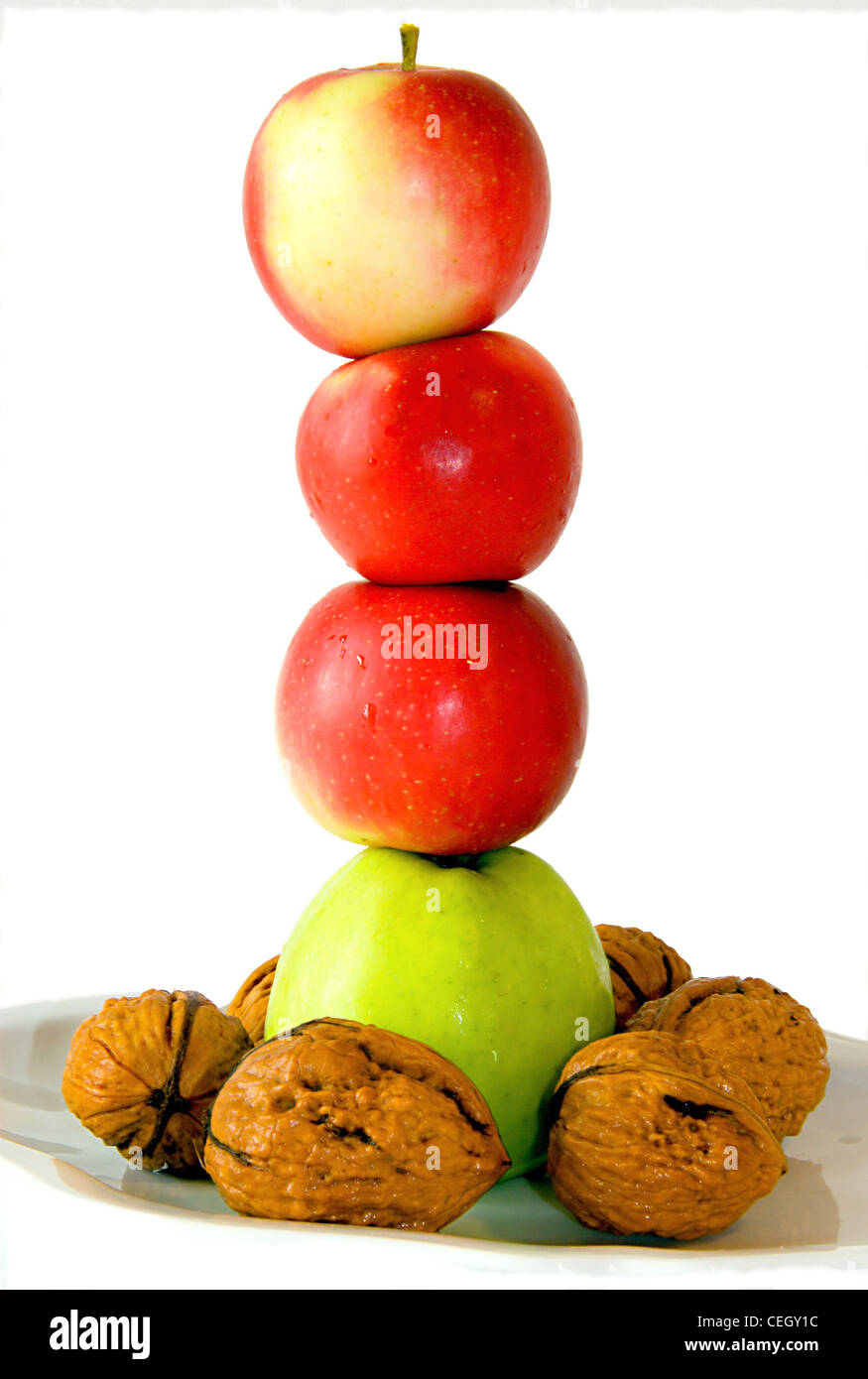 Autumn fruits in white plate Stock Photo - Alamy