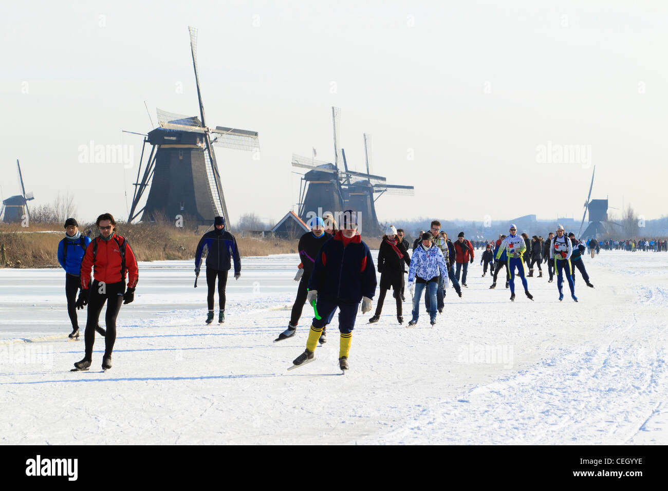 Typically Dutch scene showing people skating on natural ice with the ...