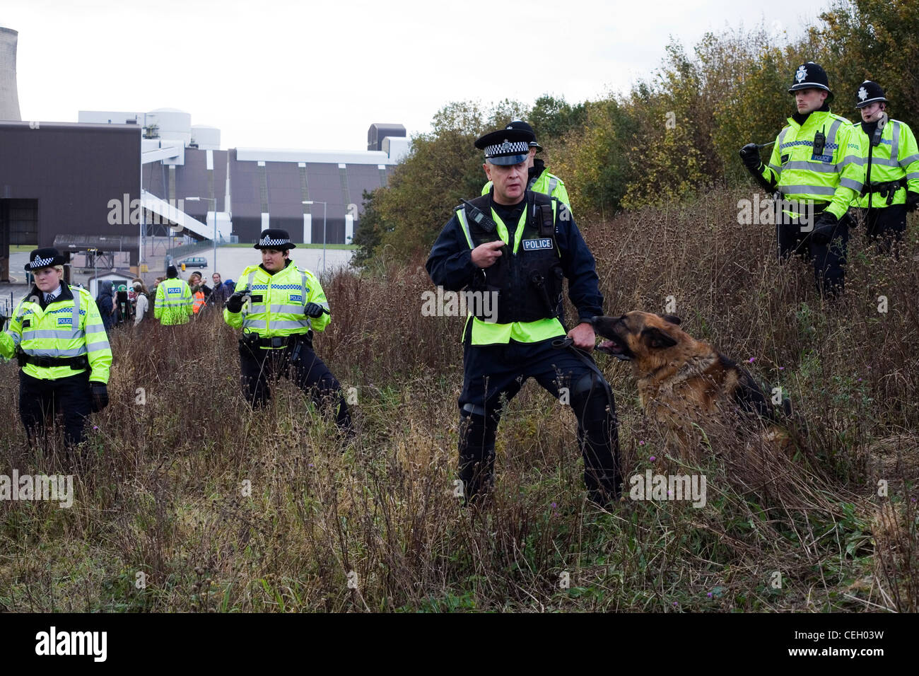 Police Officer with dog forming a kettle at Ratcliffe on Soar Power ...