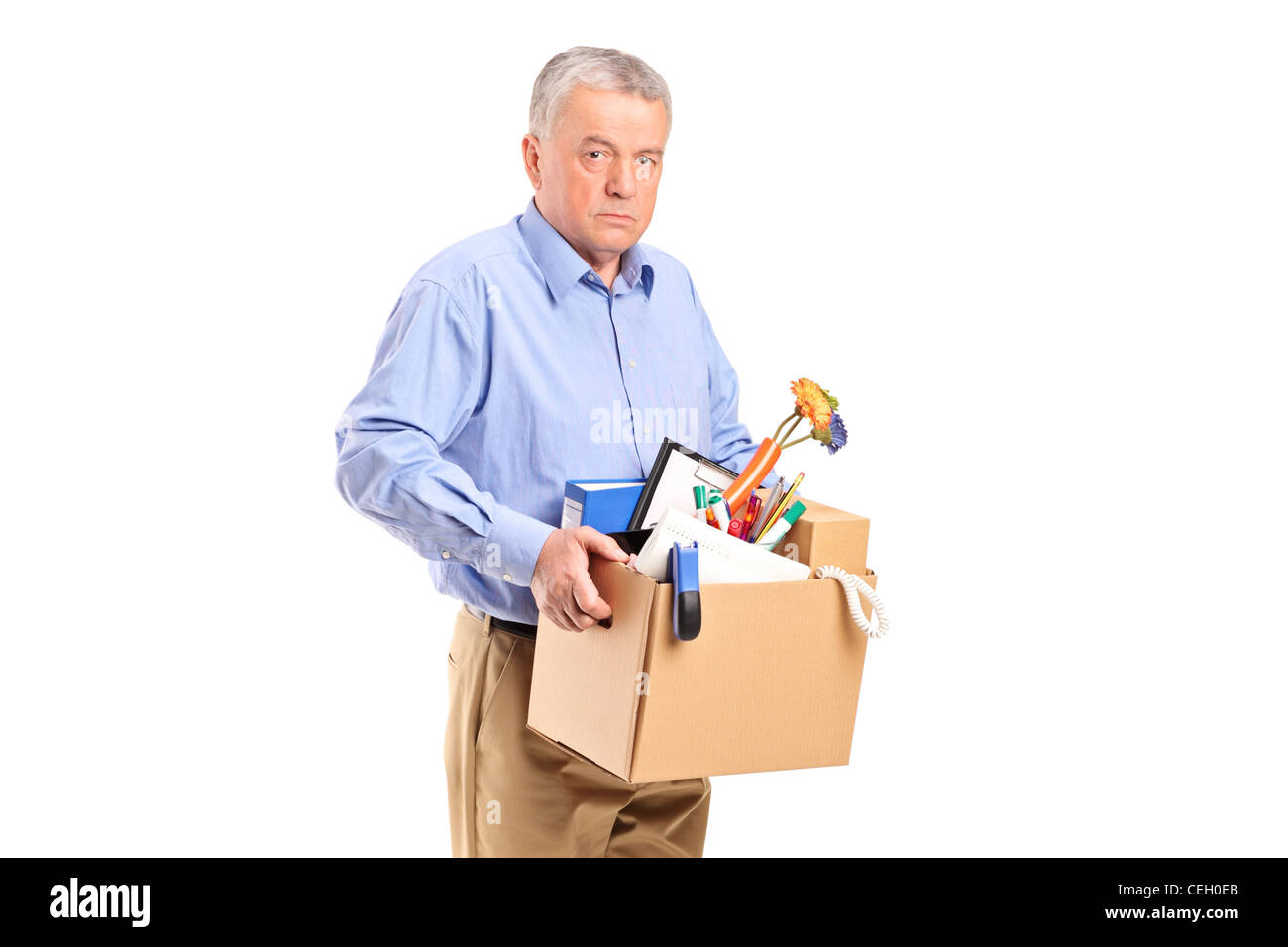 Fired man carrying a box of personal items isolated on white background ...