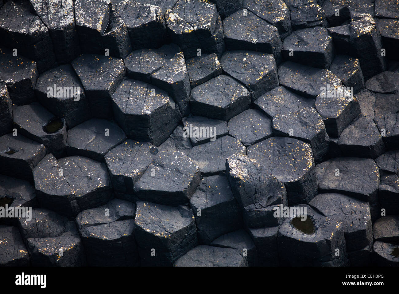 A view from above of the basalt columns reaching into the sea on the ...