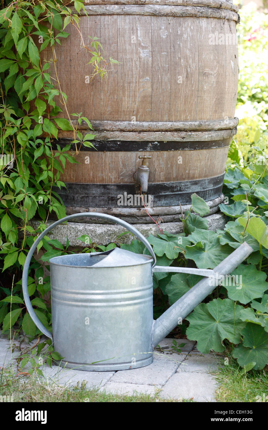 A water barrel outside in a garden Stock Photo - Alamy