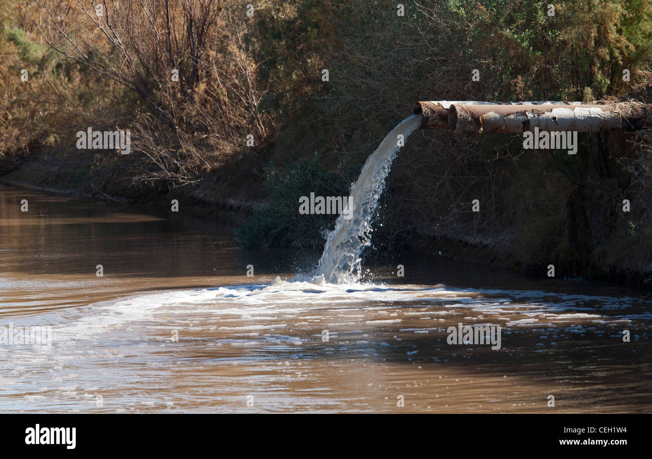 Water pouring from pipe hi-res stock photography and images - Alamy