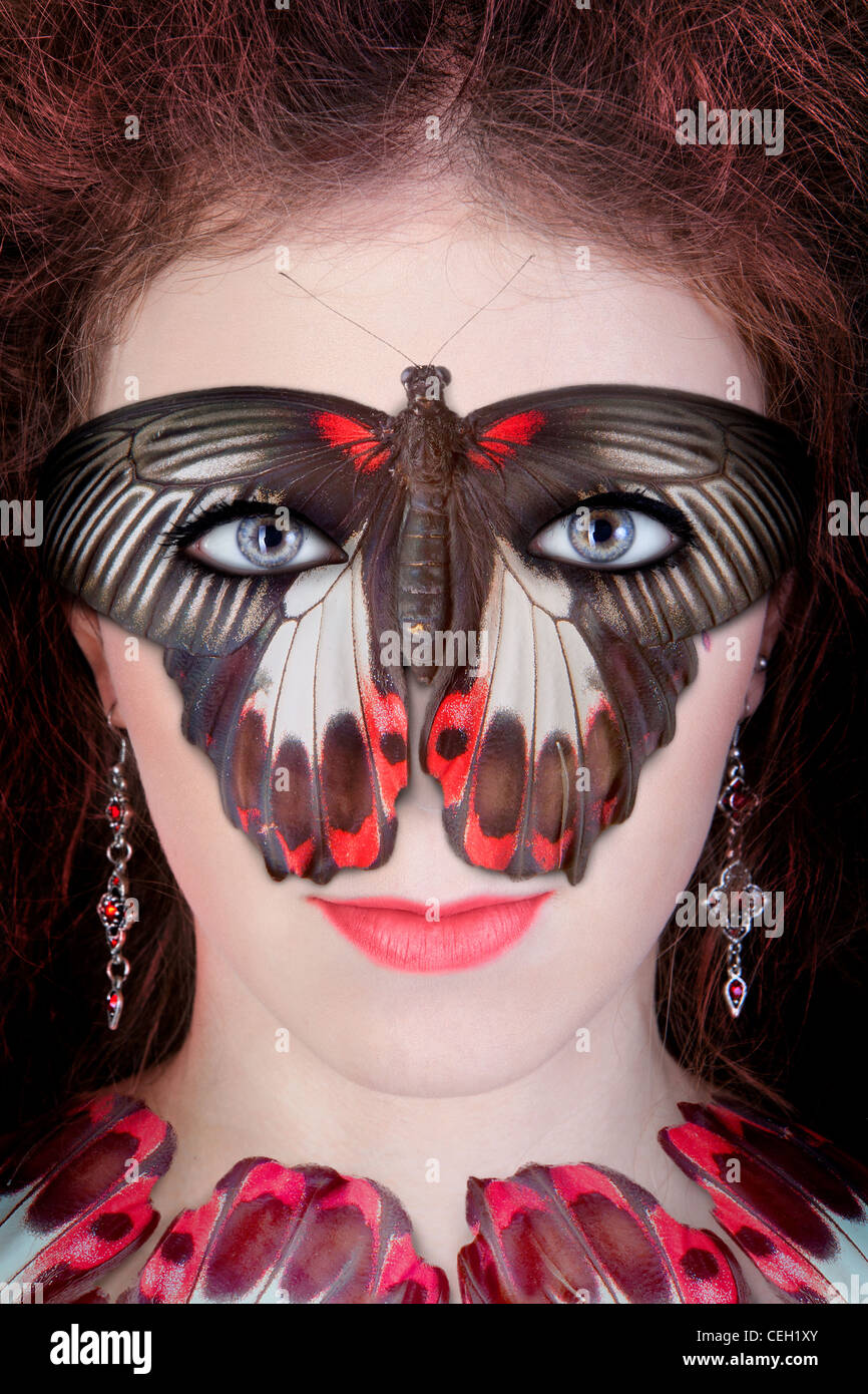 Beautiful lady in a butterfly mask Stock Photo - Alamy