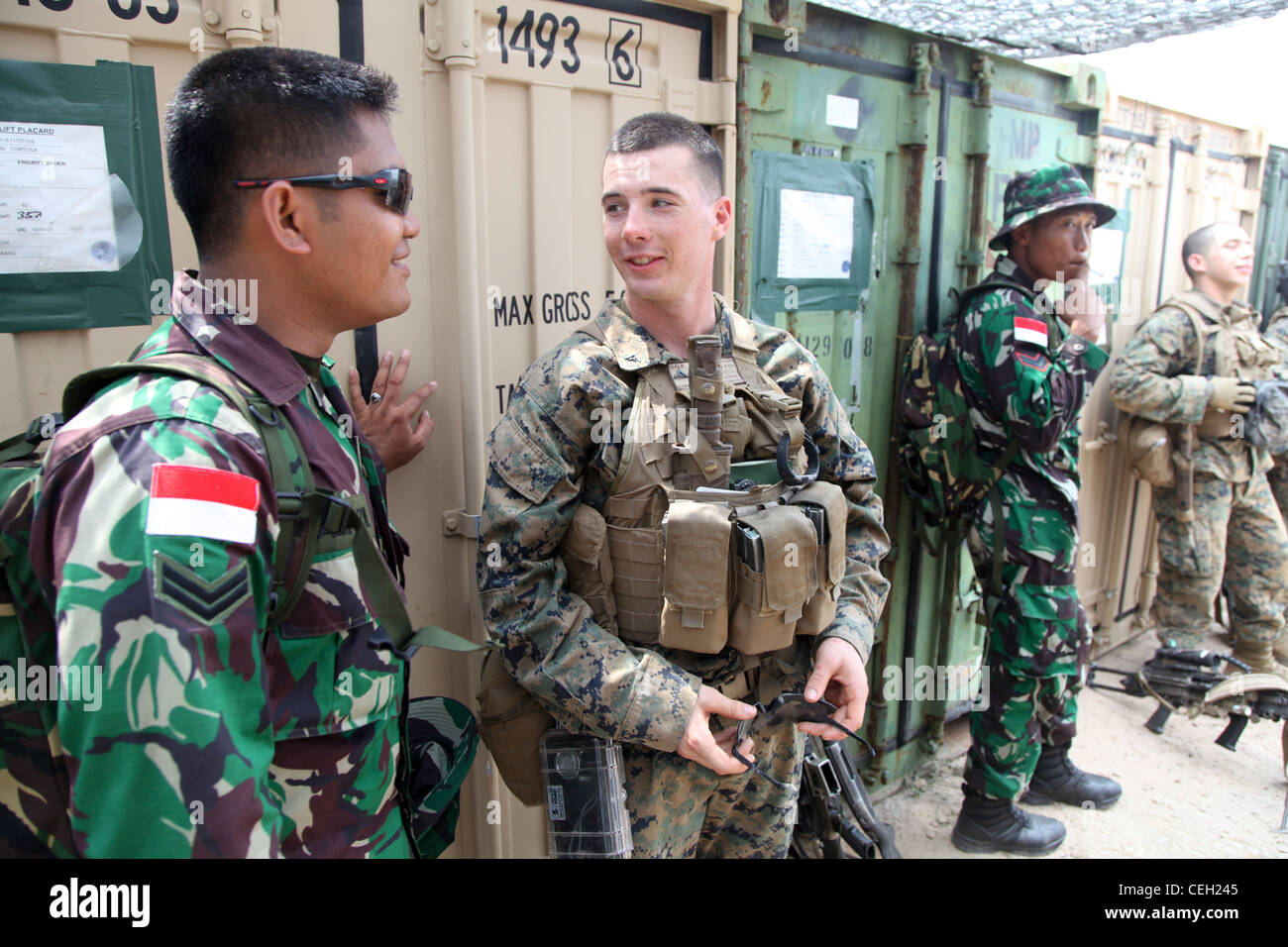 An Indonesian soldier speaks with U.S. Marine Corps Lance Cpl. Joshua ...