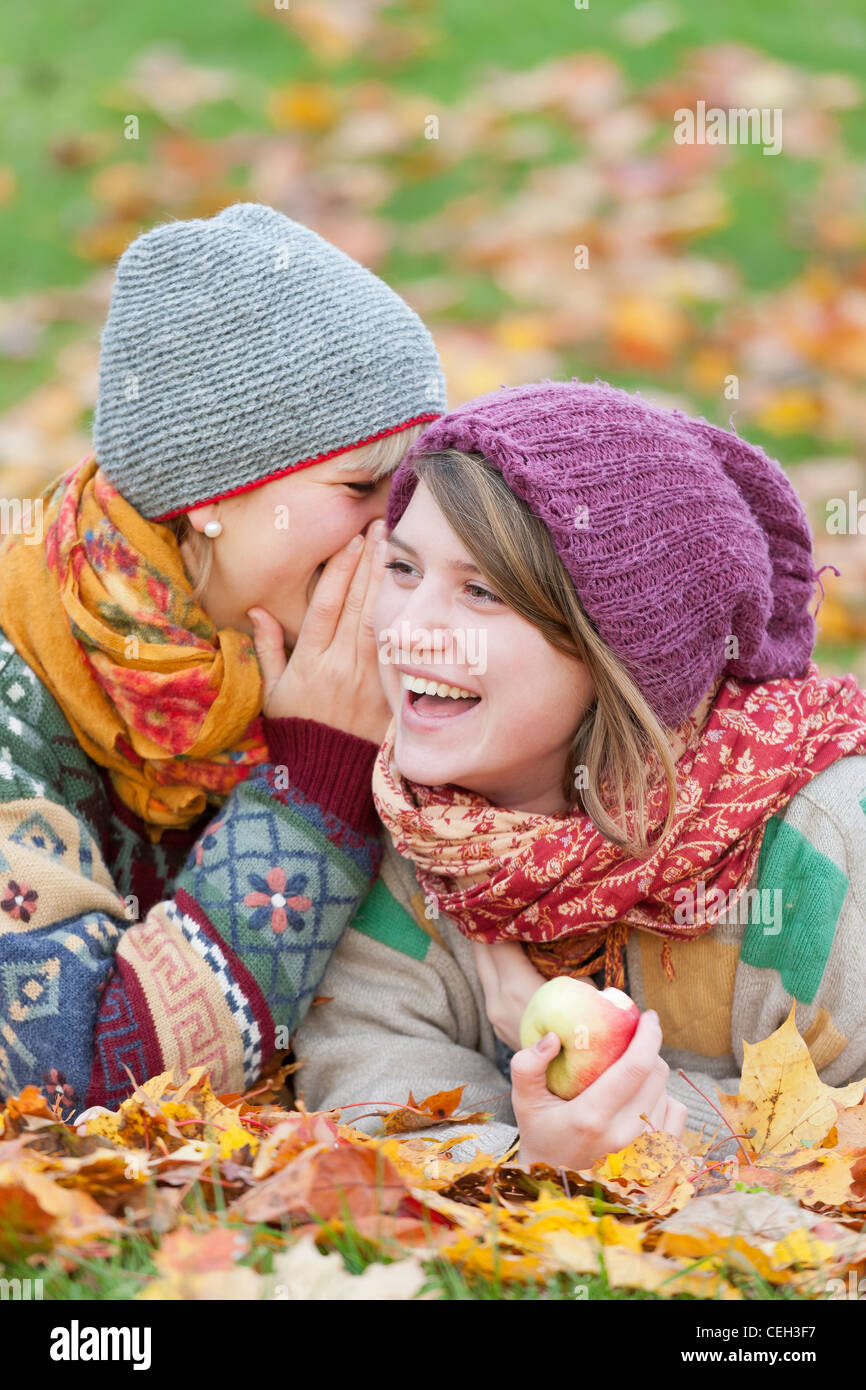 Girls sharing secrets Stock Photo - Alamy