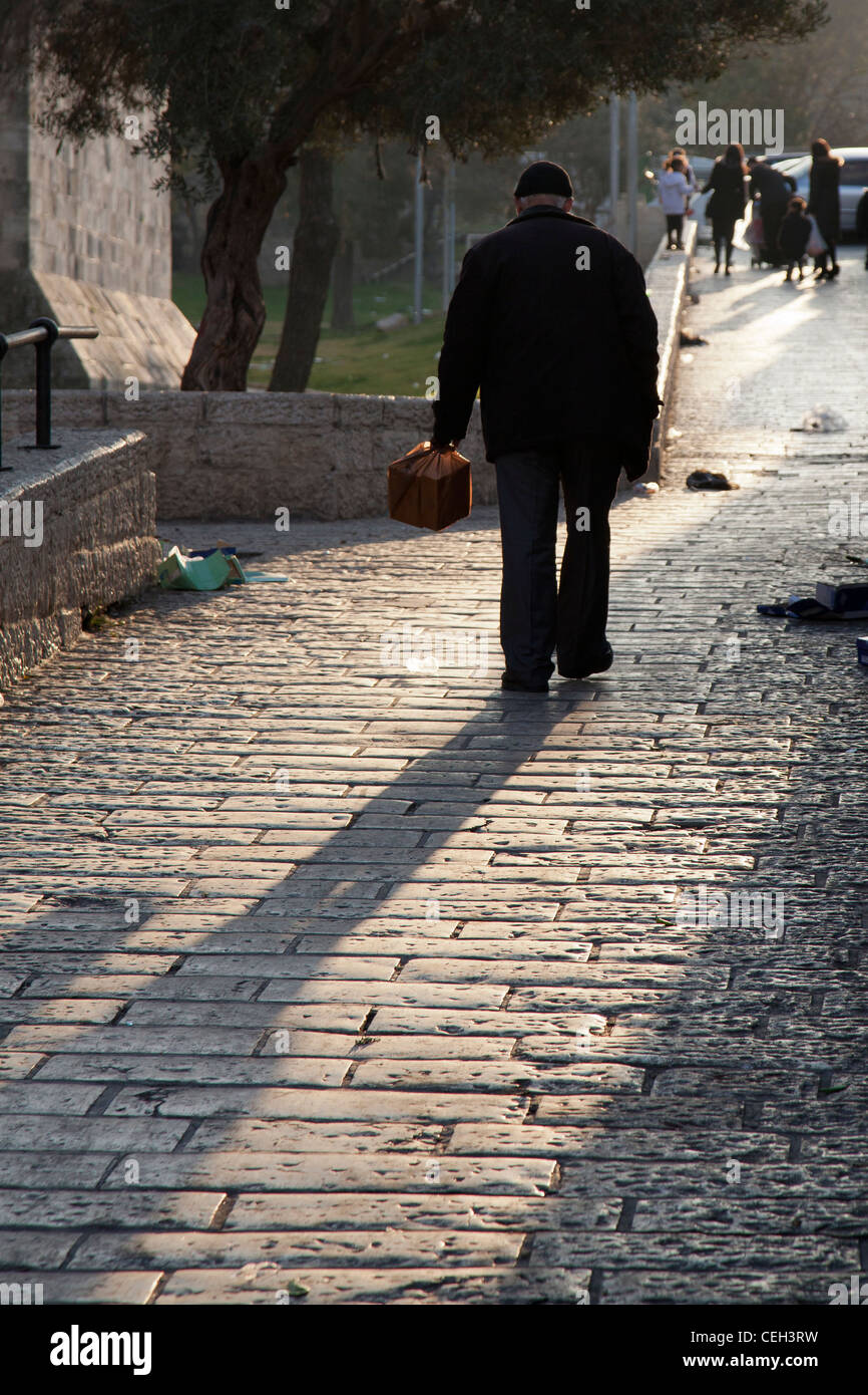 A man walking way from Damascus Gate in Jerusalem Stock Photo - Alamy
