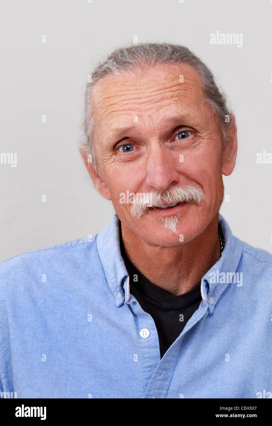 Middle aged man looking worried, concerned angry. On white background ...