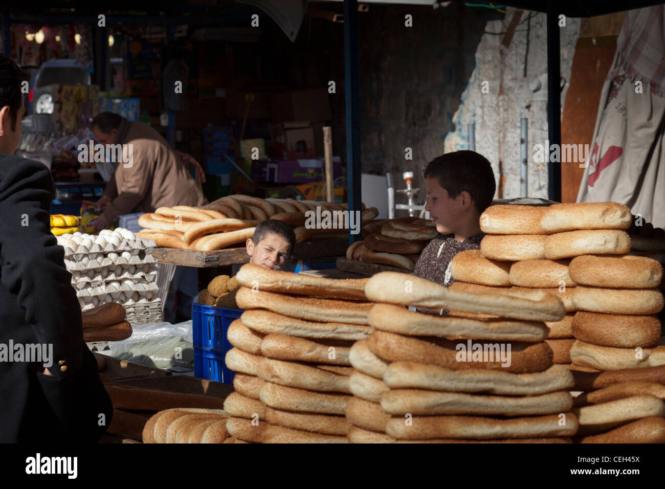 Boys selling bread in Jerusalem Stock Photo - Alamy