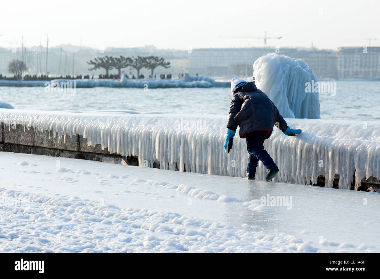 Children playing outside on winter in Geneva Stock Photo - Alamy
