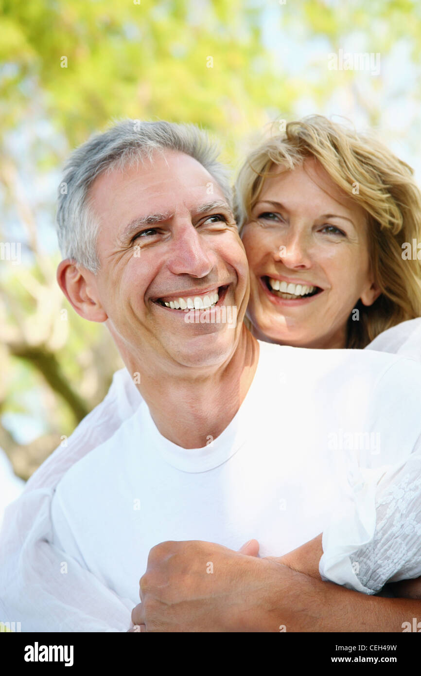 Mature couple smiling and having fun Stock Photo - Alamy
