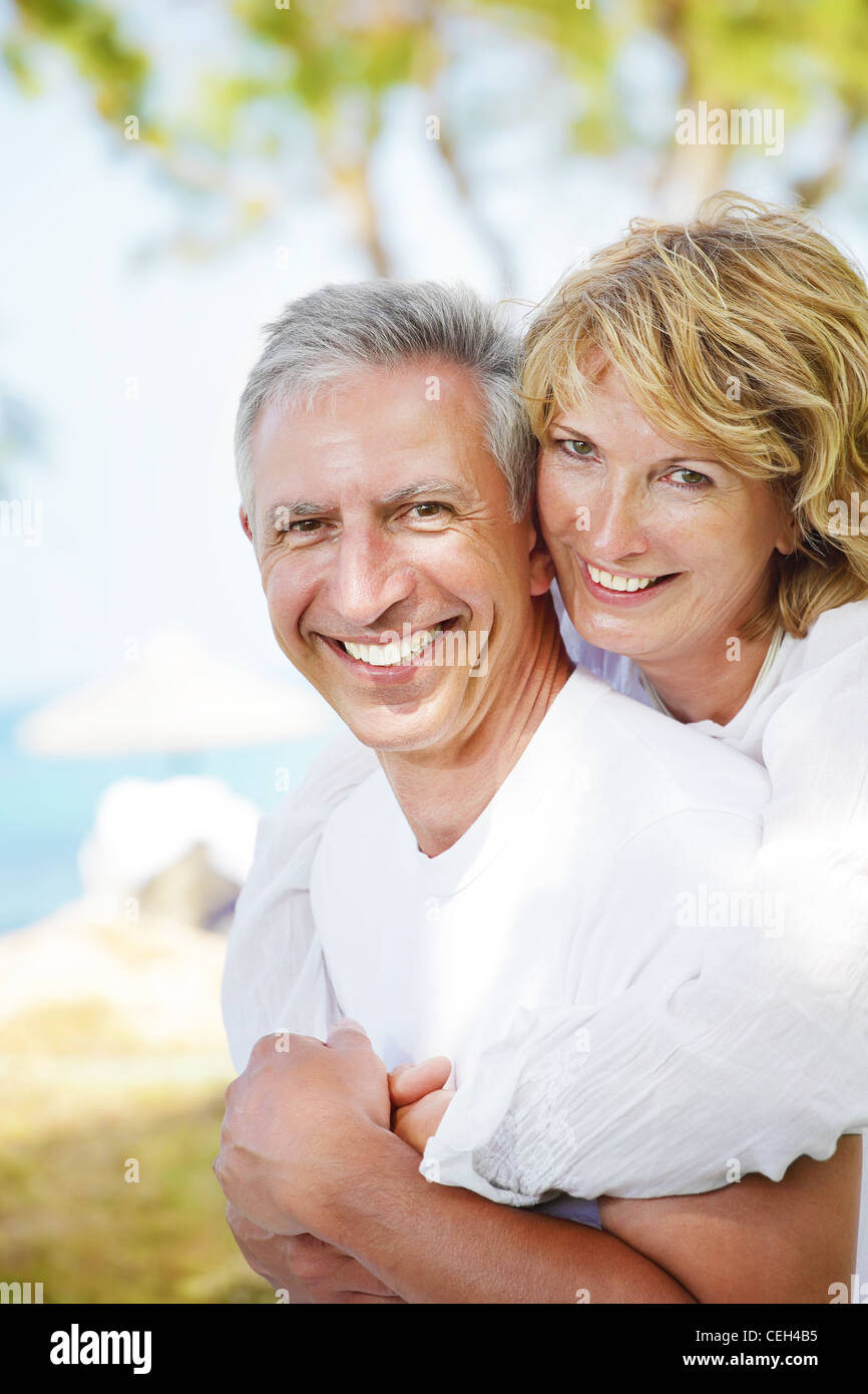 Mature couple smiling and having fun Stock Photo - Alamy