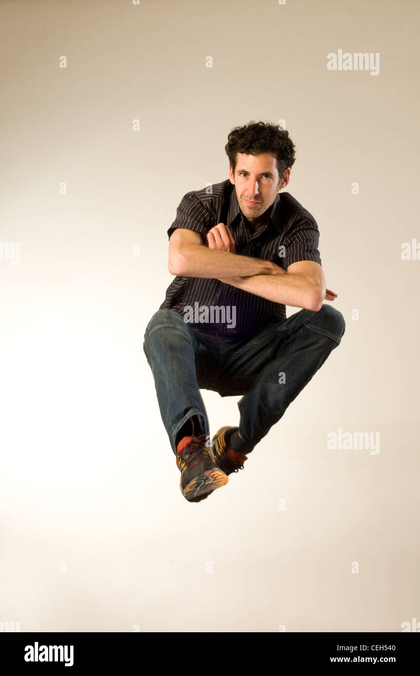 young man jumping Stock Photo - Alamy