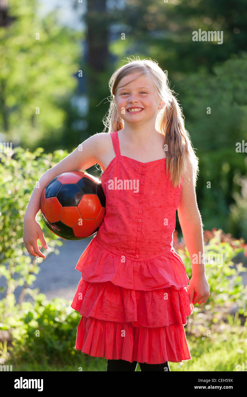 Girl Plays With Red Ball High Resolution Stock Photography and Images ...