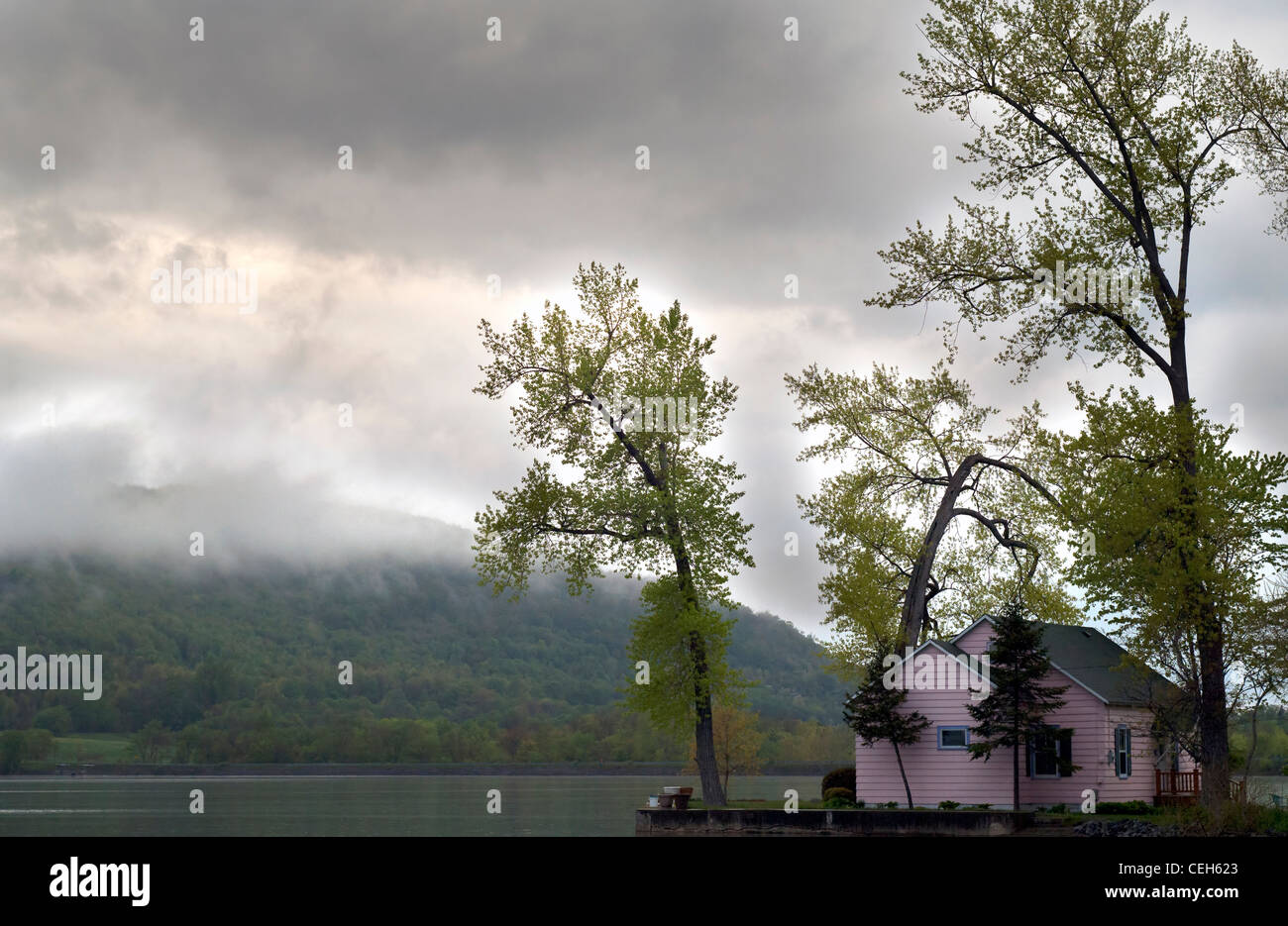 pink vacation house on a lake Stock Photo - Alamy
