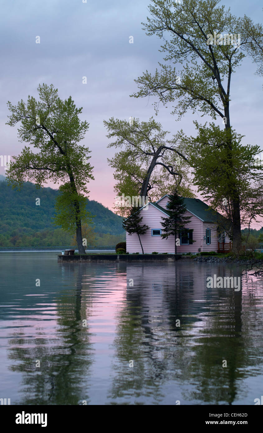 pink vacation house on a lake Stock Photo - Alamy