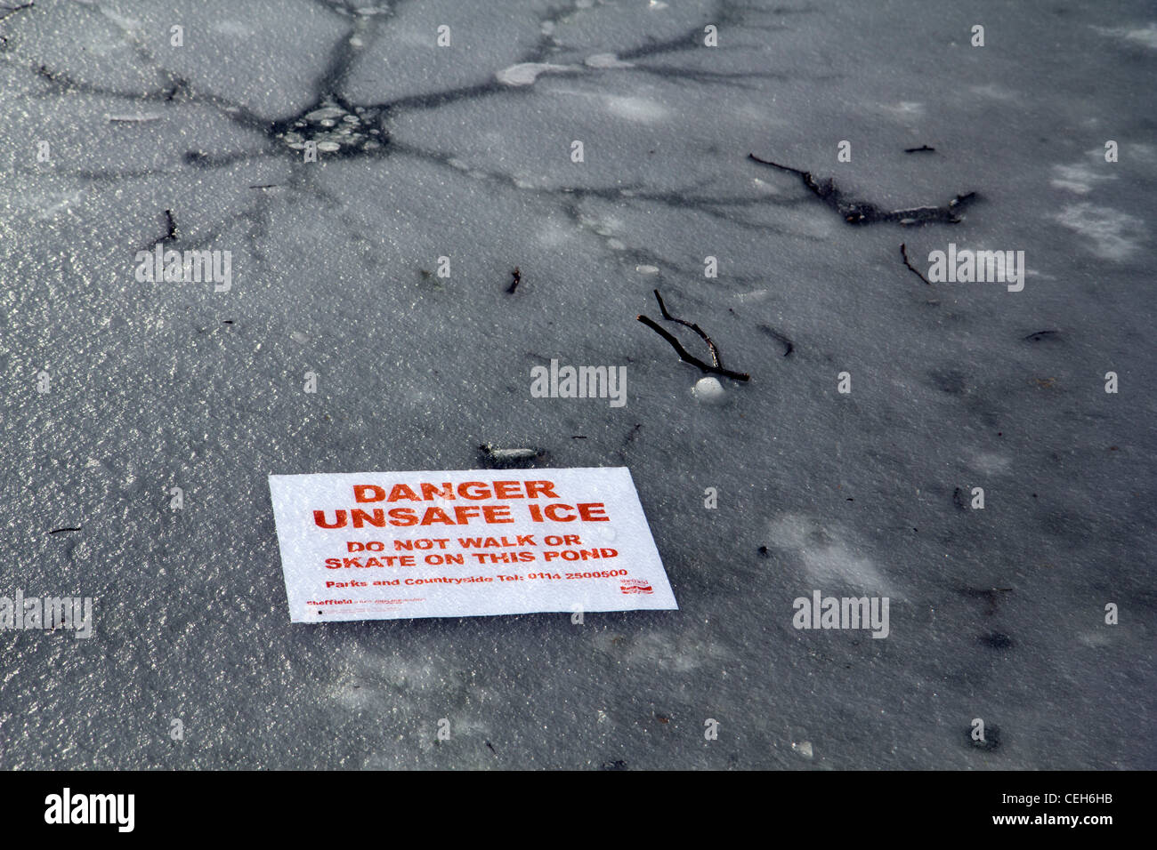 Red warning sign in frozen lake/pond Danger Unsafe Ice sign potential ...
