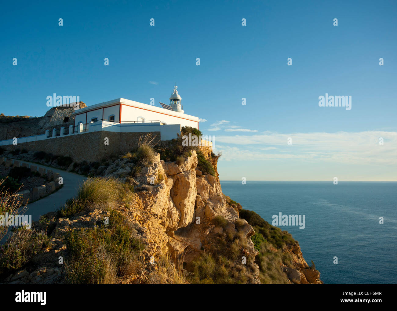 Lighthouse beautifully located on top of a cliff Stock Photo - Alamy