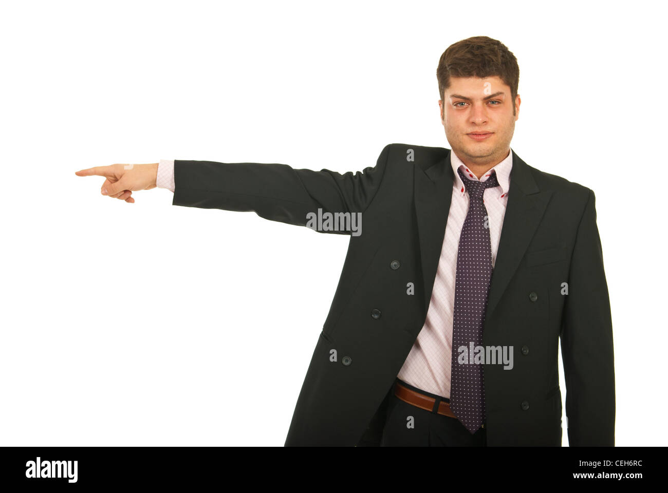 Business man pointing to left part of image isolated on white ...