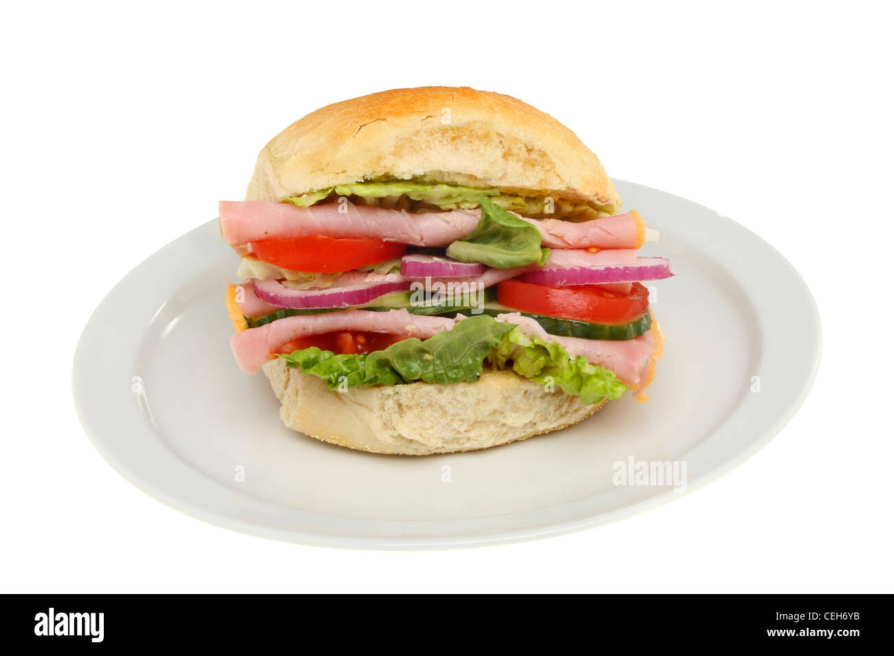 Ham salad roll on a plate isolated against white Stock Photo - Alamy