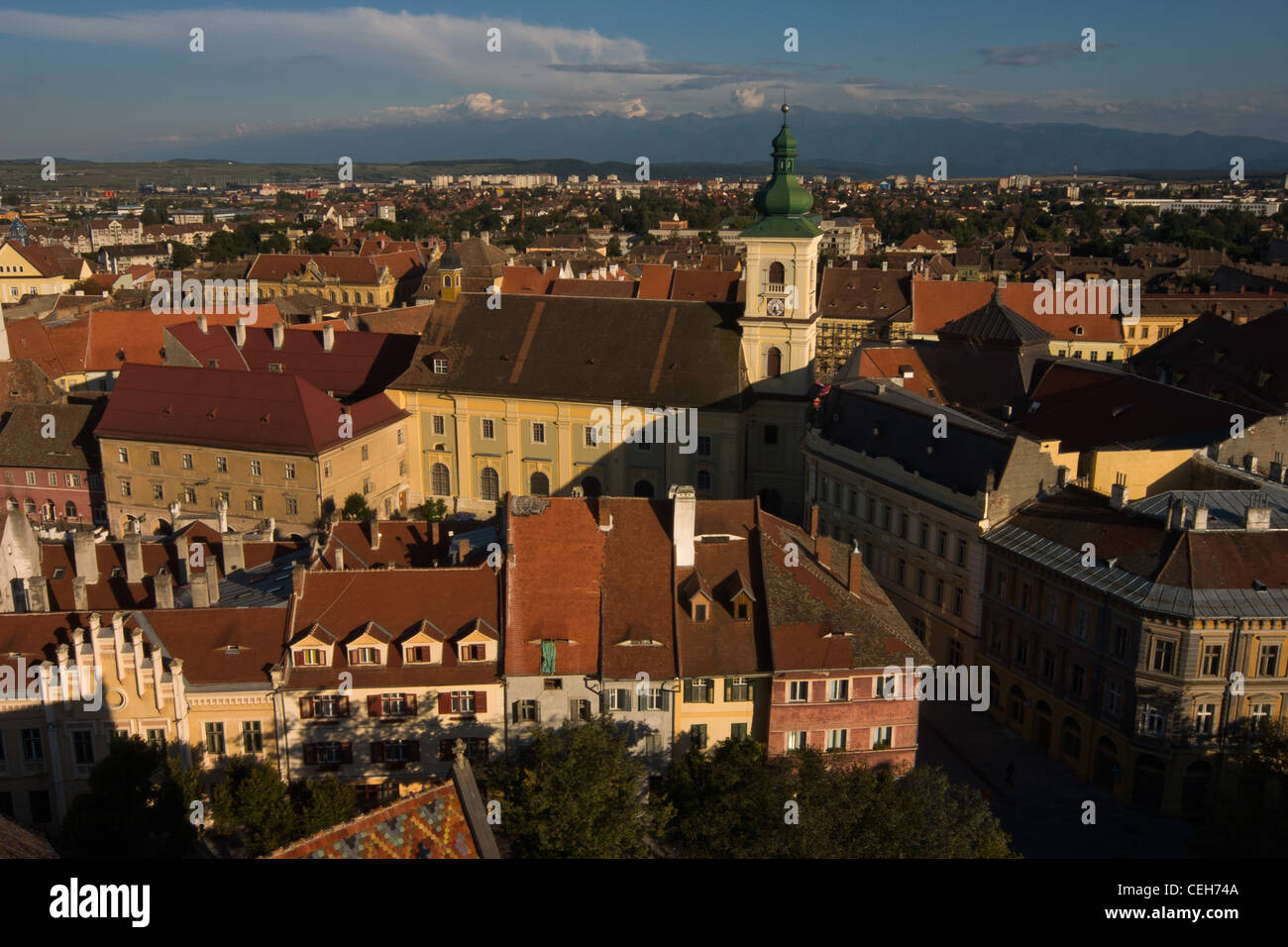 Aerial view over Sibiu city with Fagaras Mountains in the background ...