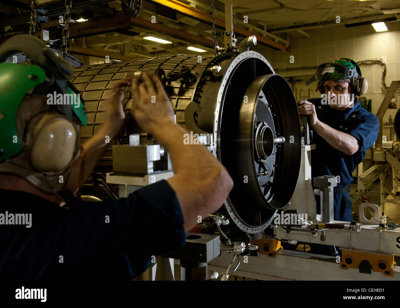 Airman Travis Baldridge and Aviation Machinist's Mate 3rd Class Ryan ...