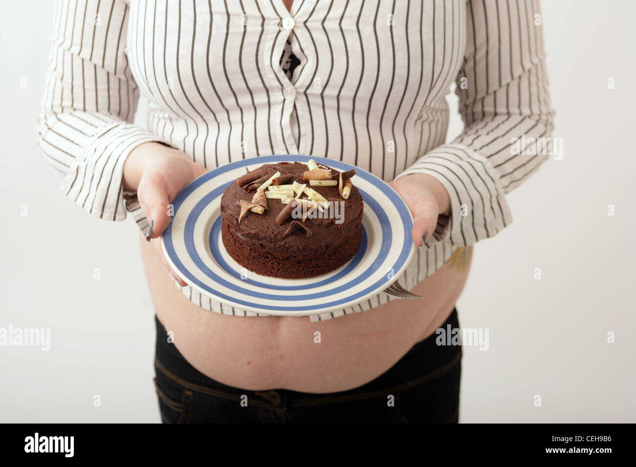 Obesity woman cake hi-res stock photography and images - Alamy