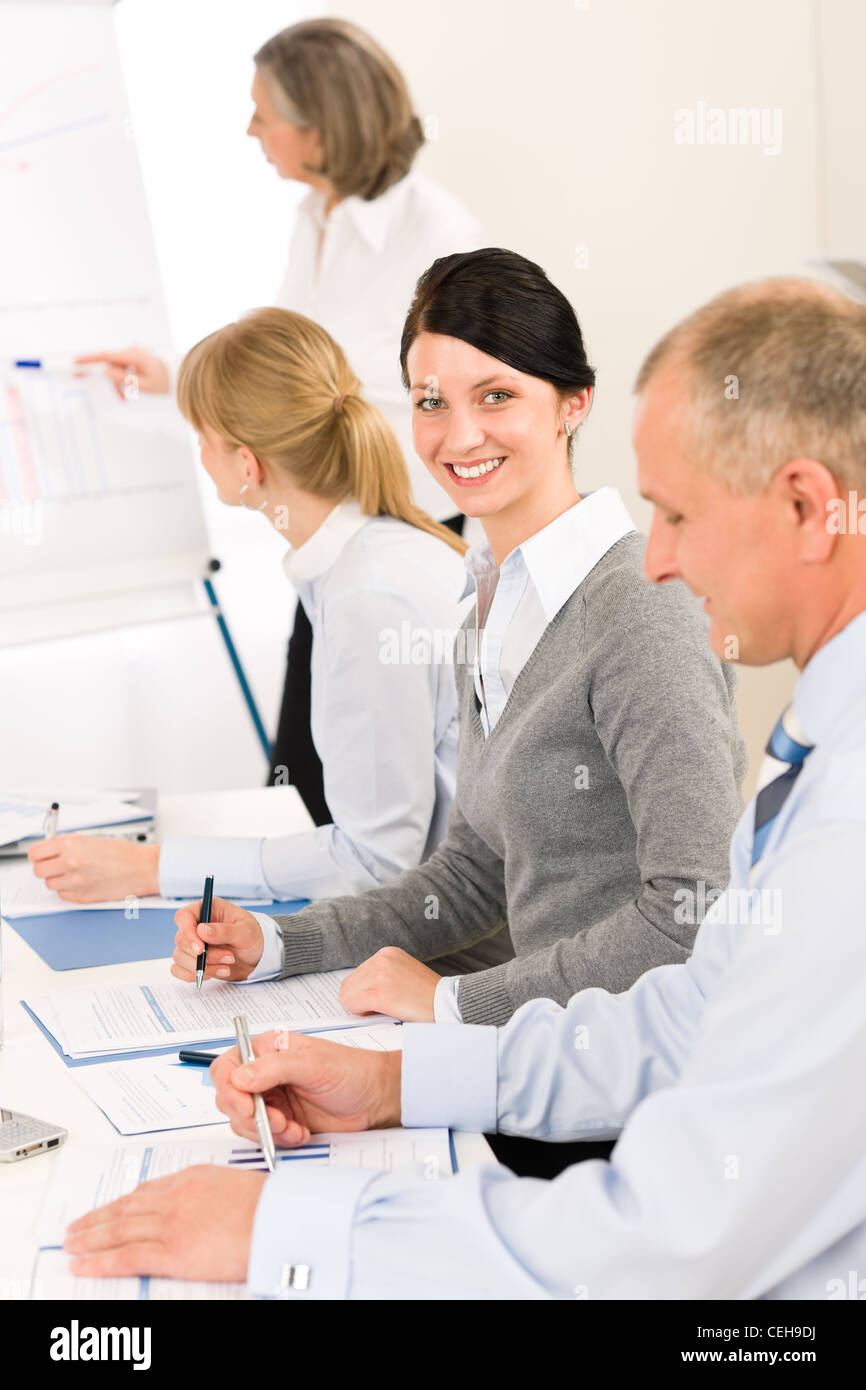 Giving presentation young executive during meeting woman pointing flip ... Giving presentation young executive during meeting woman pointing flip ...