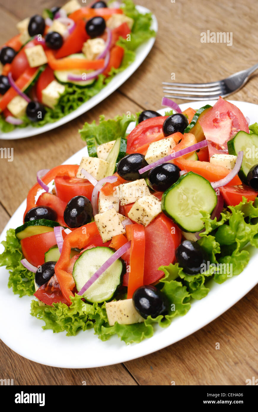 Vegetable salad on the oak table Stock Photo - Alamy