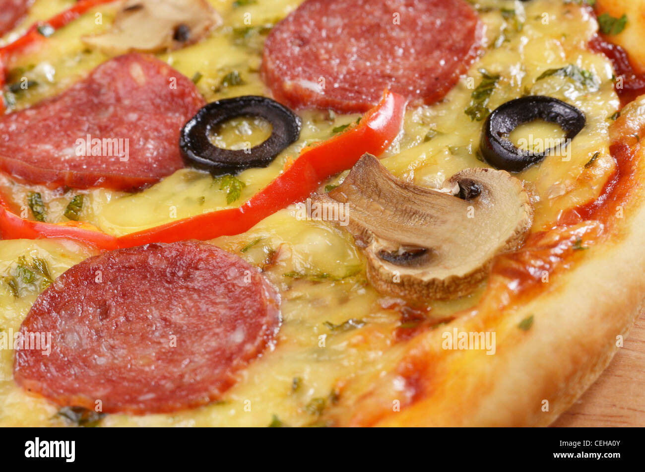 Mushroom and pepperoni pizza closeup Stock Photo - Alamy