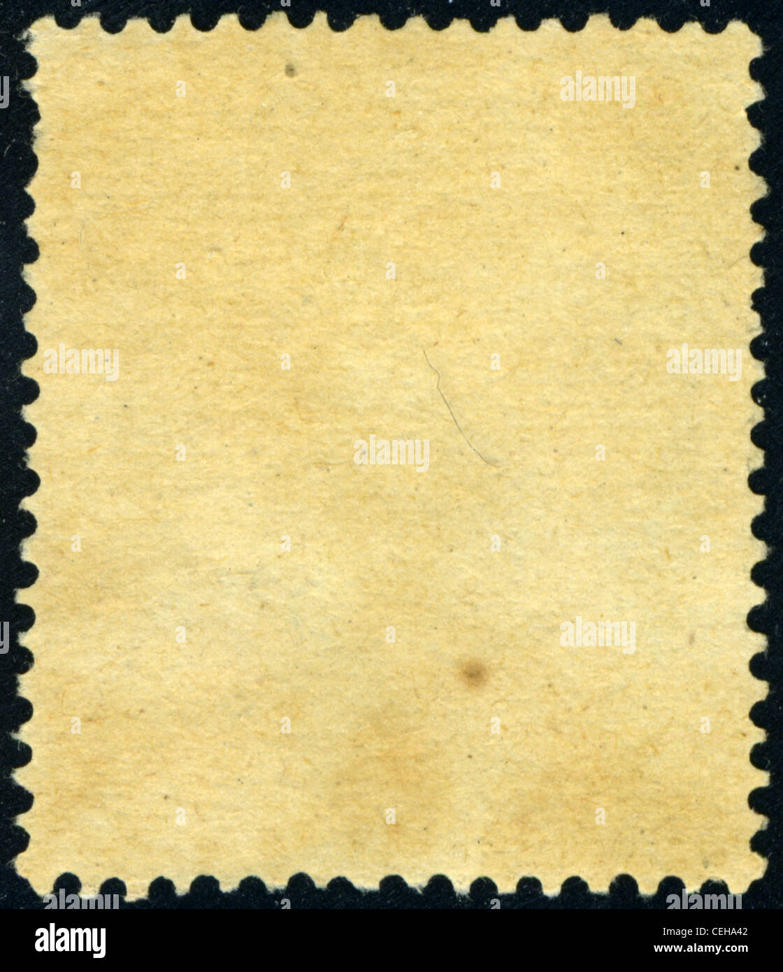 The reverse side of a postage stamp Stock Photo - Alamy