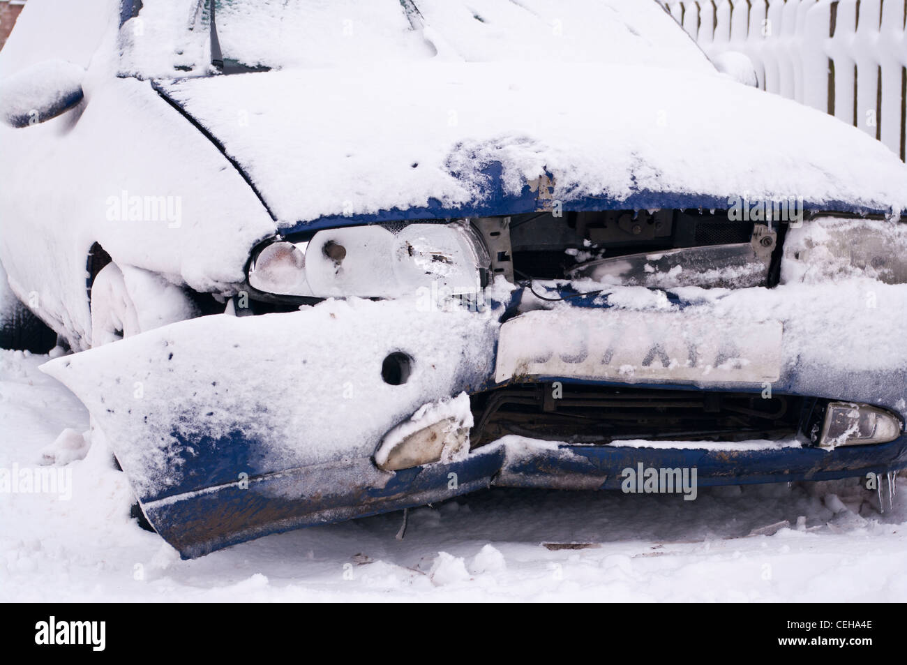 Damaged Dented Broken Down Car Vehicle After an Accident In The Snow ...