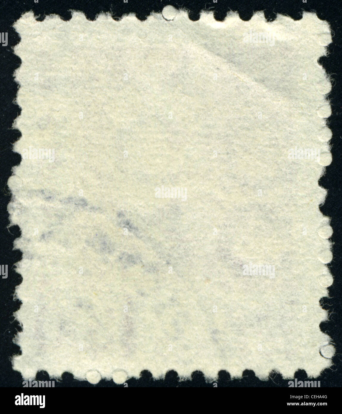 The reverse side of a postage stamp Stock Photo - Alamy