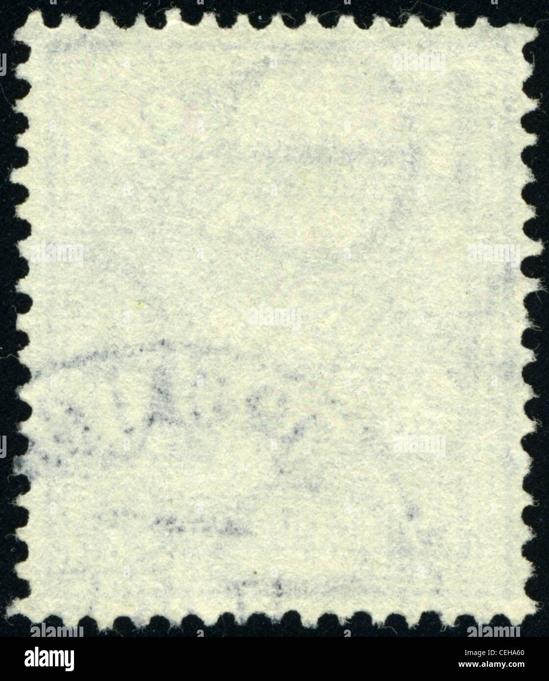 The reverse side of a postage stamp Stock Photo - Alamy