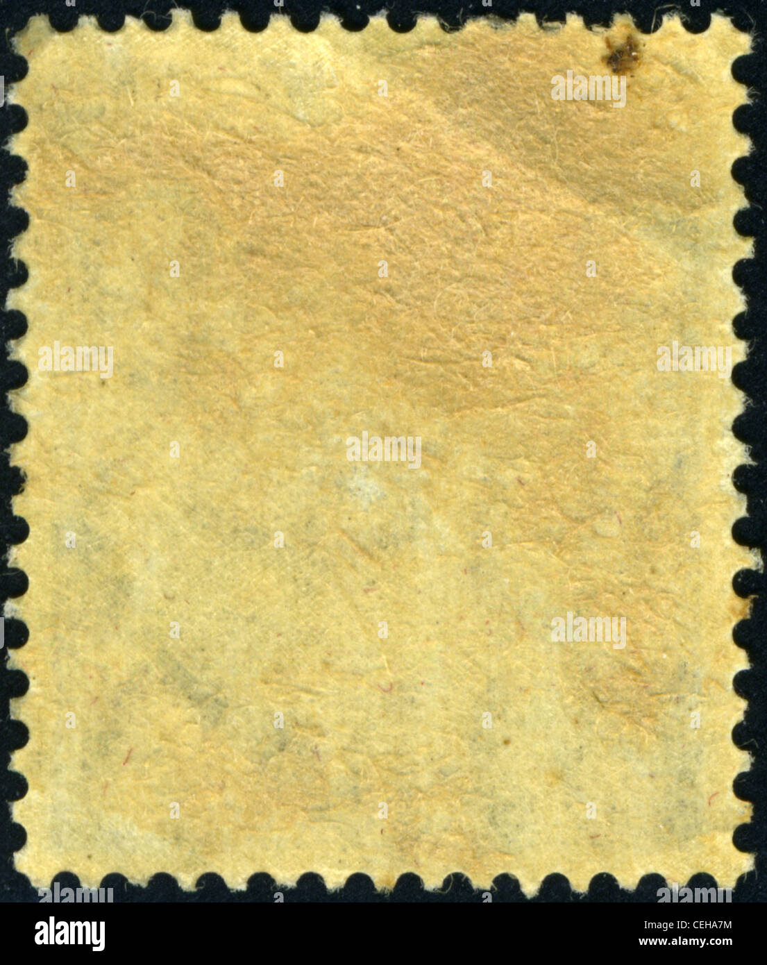 The reverse side of a postage stamp Stock Photo - Alamy