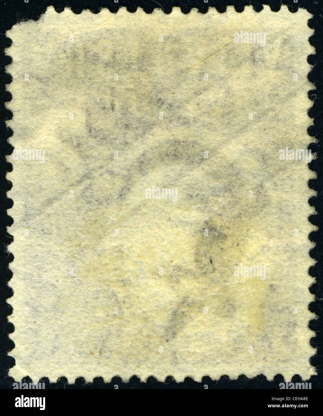 The reverse side of a postage stamp Stock Photo - Alamy