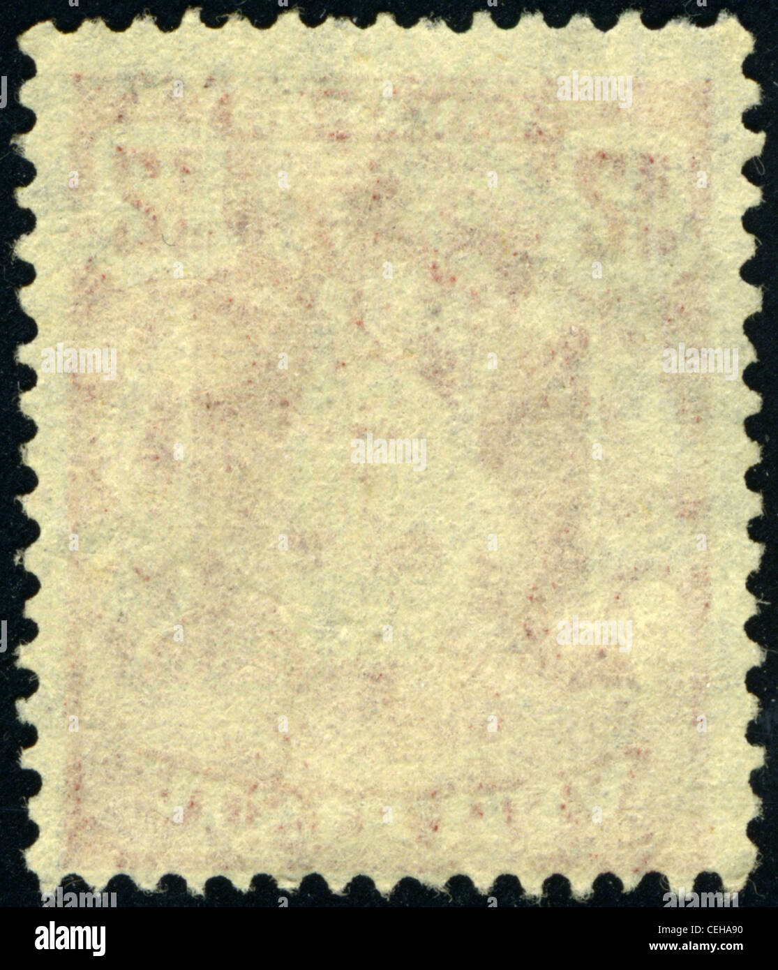 The reverse side of a postage stamp Stock Photo - Alamy