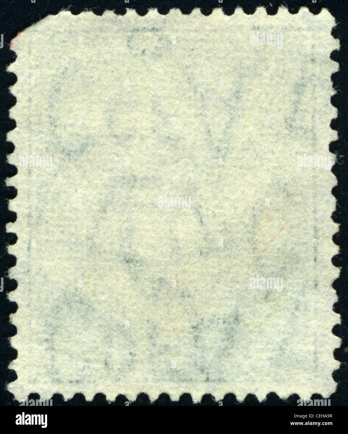 The reverse side of a postage stamp Stock Photo - Alamy