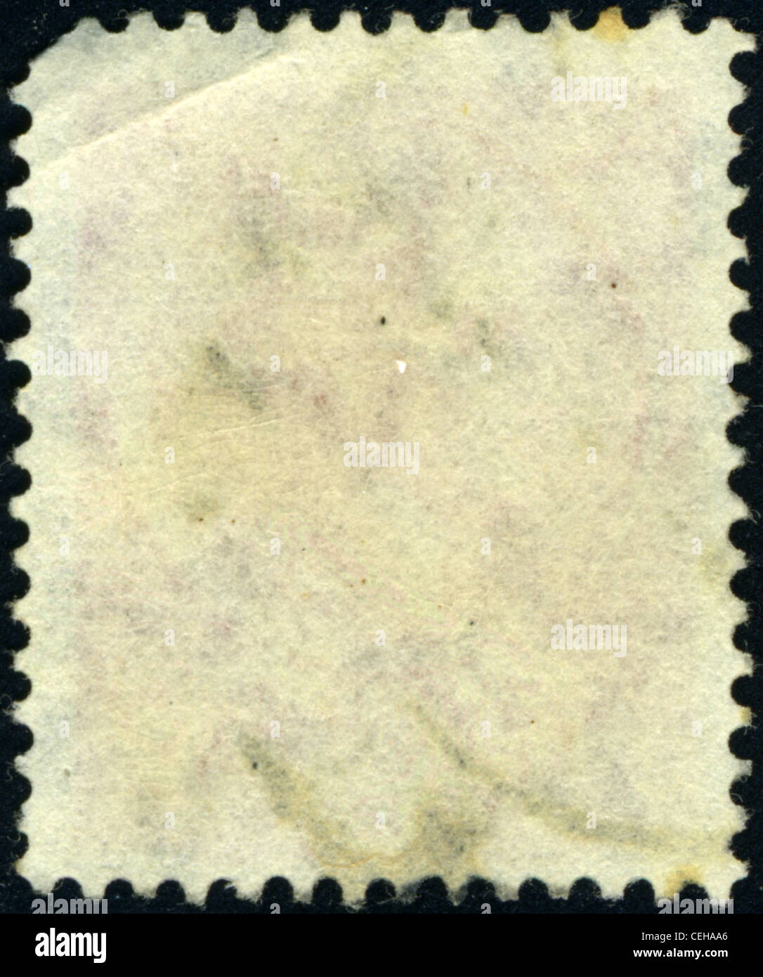 The reverse side of a postage stamp Stock Photo - Alamy
