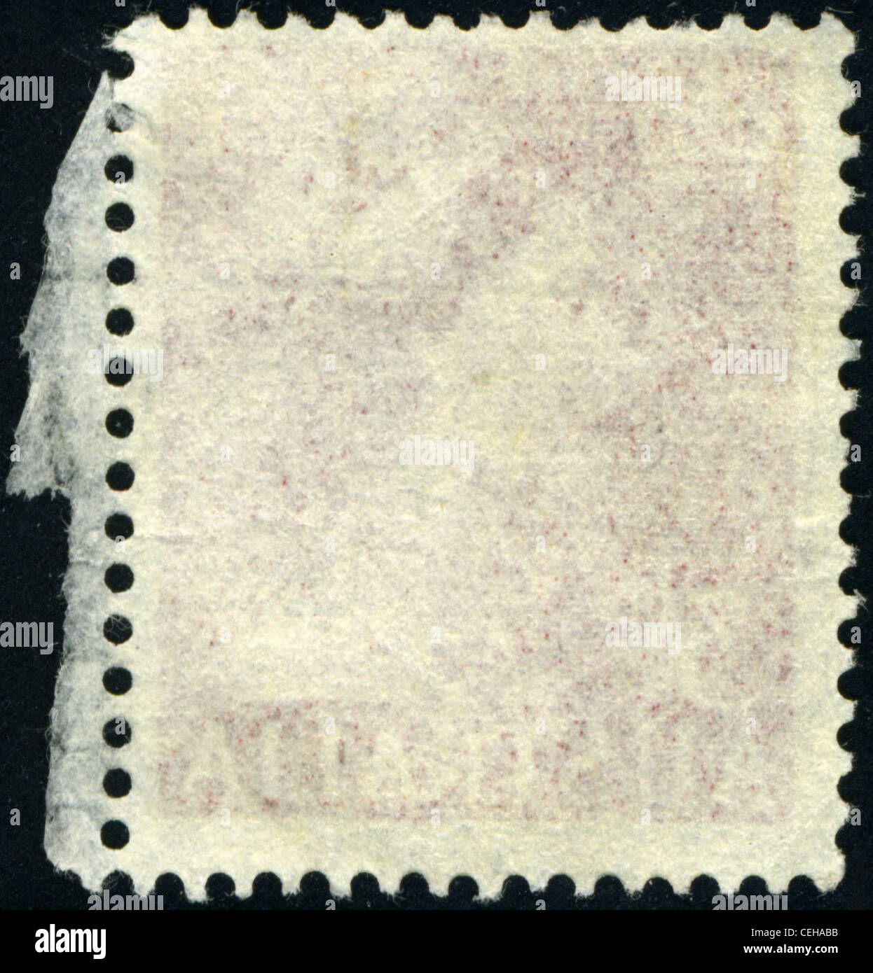 The reverse side of a postage stamp Stock Photo - Alamy