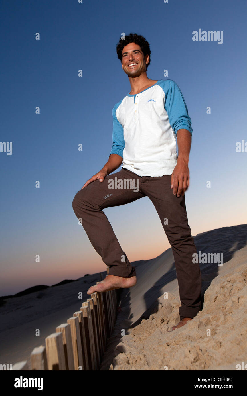 Man on beach dusk hi-res stock photography and images - Alamy
